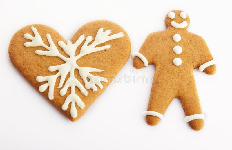 Human and Heart Shaped Gingerbread Cookie Isolated on a White ...