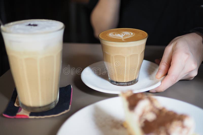 Human hold coffee on table stock image. Image of flat - 148828259