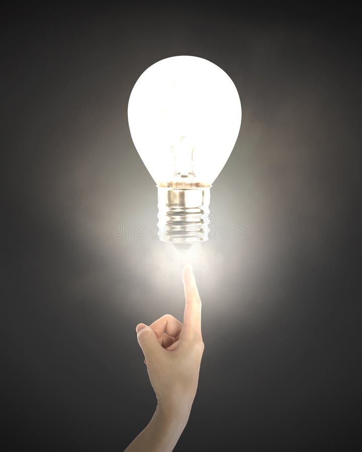 Human Index Finger Pointing at Lightbulb with Bright Light Stock Image ...