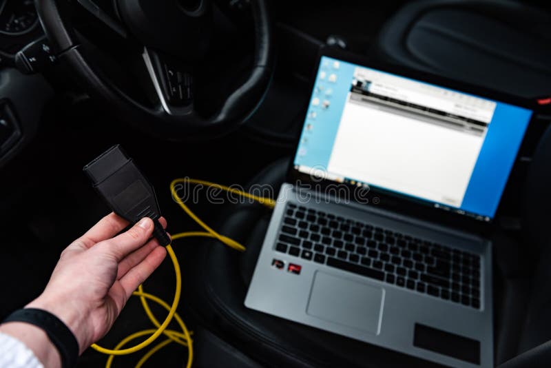 Human Making Car Diagnostics Using OBD Device and Computer. Stock Image ...