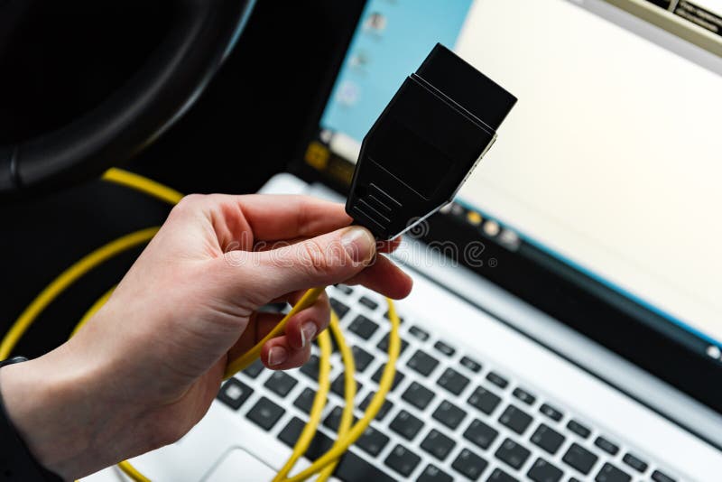 Human Making Car Diagnostics Using OBD Device and Computer. Stock Photo ...