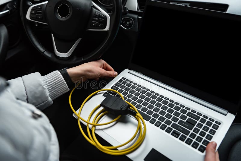 Human Making Car Diagnostics Using OBD Device and Computer. Stock Photo ...