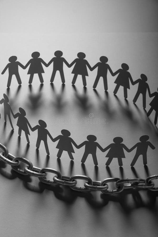 Human Paper Figures in Front of Metal Chain on a White Surface. Freedom ...