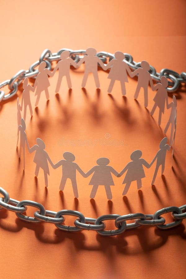 Human Paper Figures Standing Around a Ball of Metal Chain on a Red ...