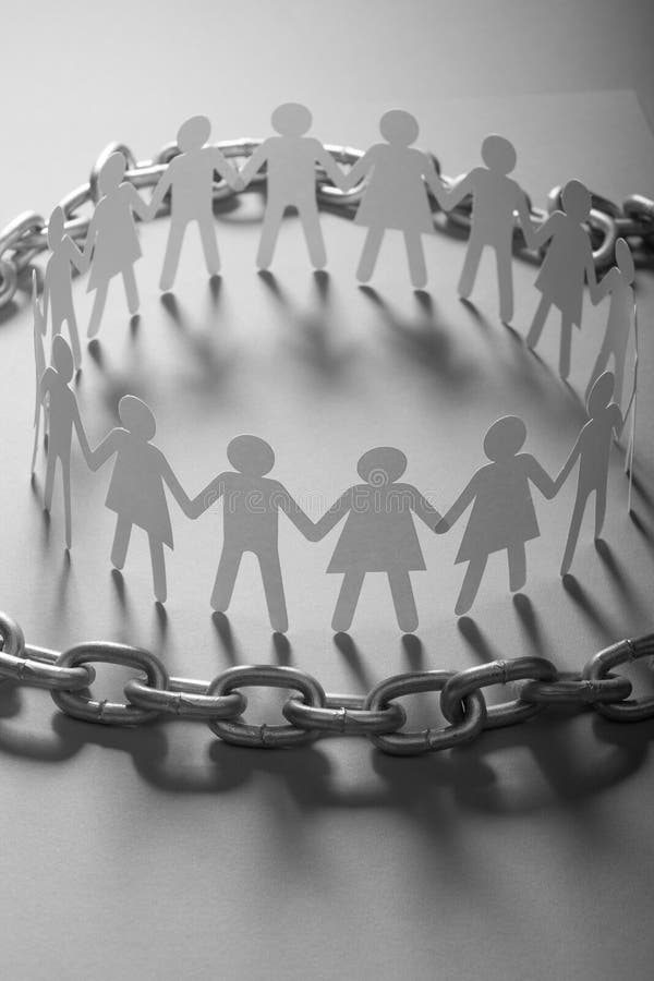 Human Paper Figures Surrounded by Metal Chain on White Surface. Freedom ...