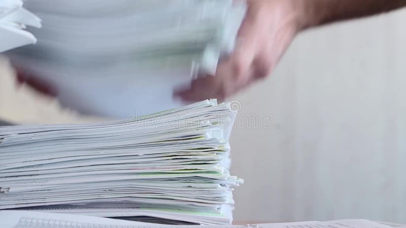 Human Putting a Stack of Sheets on a Desk at the Office. Stock Video ...