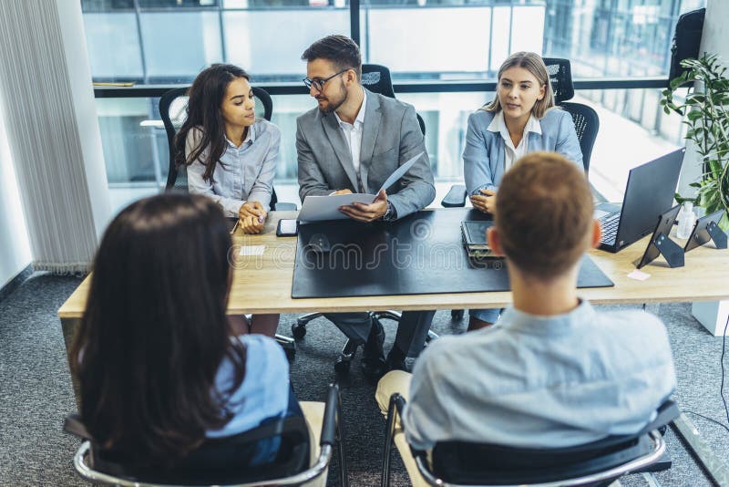 Human Resource Team Talking To a Candidate during a Job Interview in ...