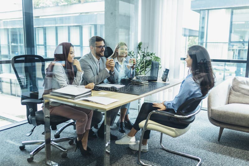 Human Resource Team Talking To a Candidate during a Job Interview in ...