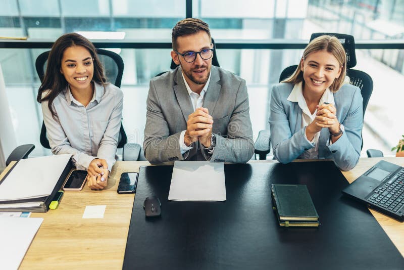Human Resource Team Talking To a Candidate during a Job Interview in ...