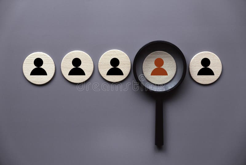 Human Resources and Management Concept. Magnifying Glass Over a Red ...