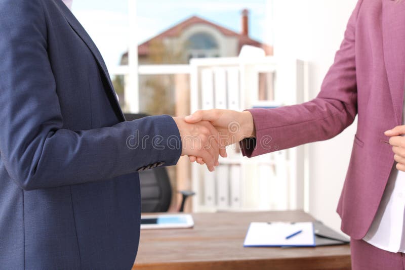 Human Resources Manager Shaking Hands with Applicant during Job ...