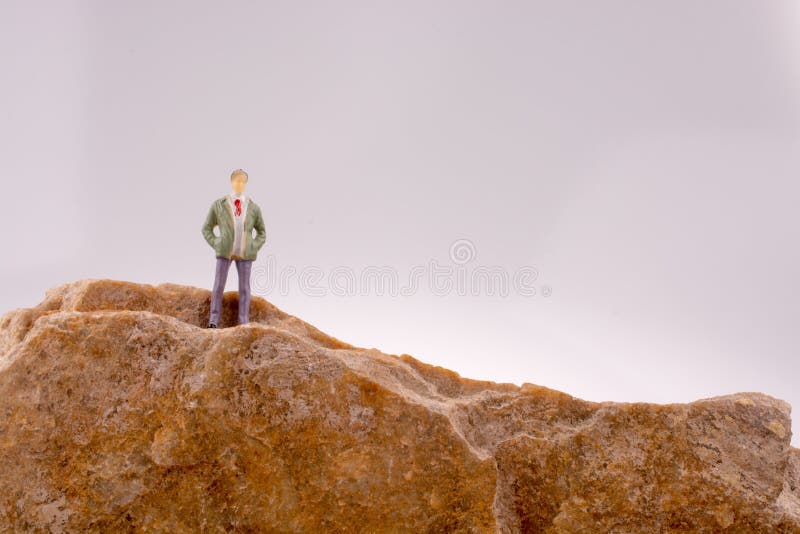 Human on a rock stock image. Image of people, person - 68846405