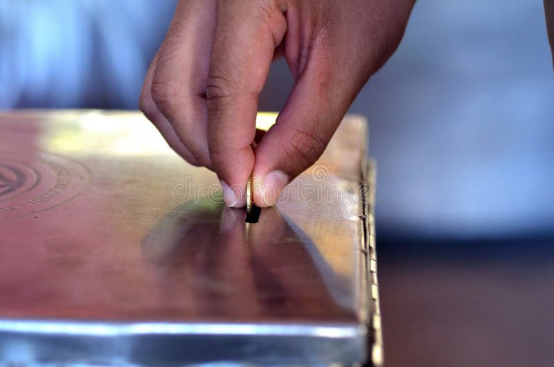 Human& X27;s Hand Drops a Coin in a Donation Box Stock Image - Image of ...