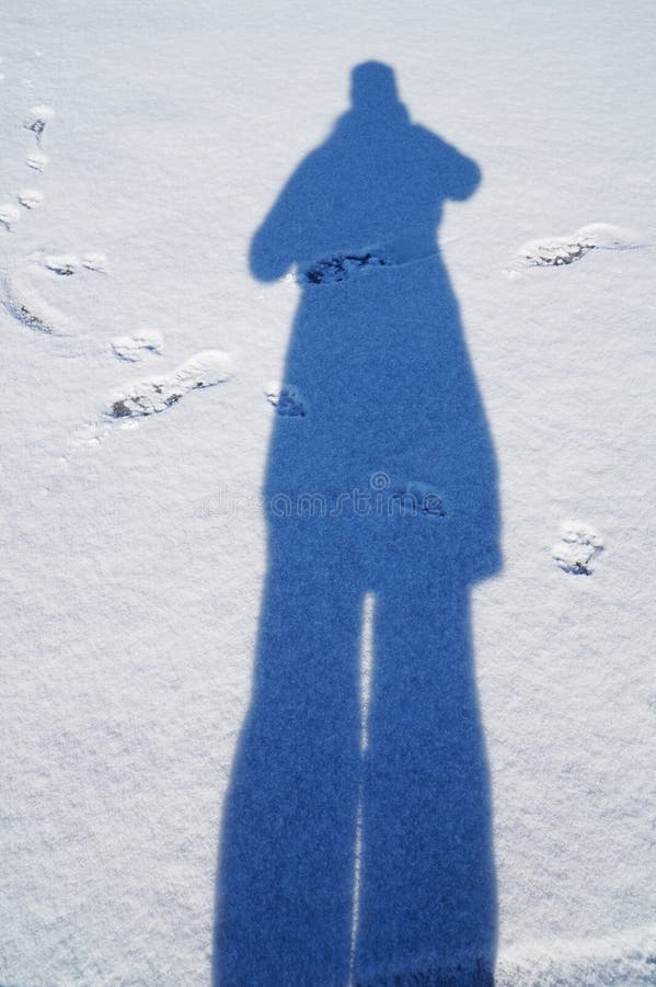 Human shadow on fresh snow stock photo. Image of morning - 370381440