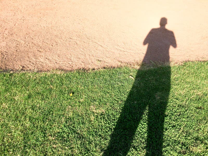 Human shadow on ground stock image. Image of lonely - 182340295