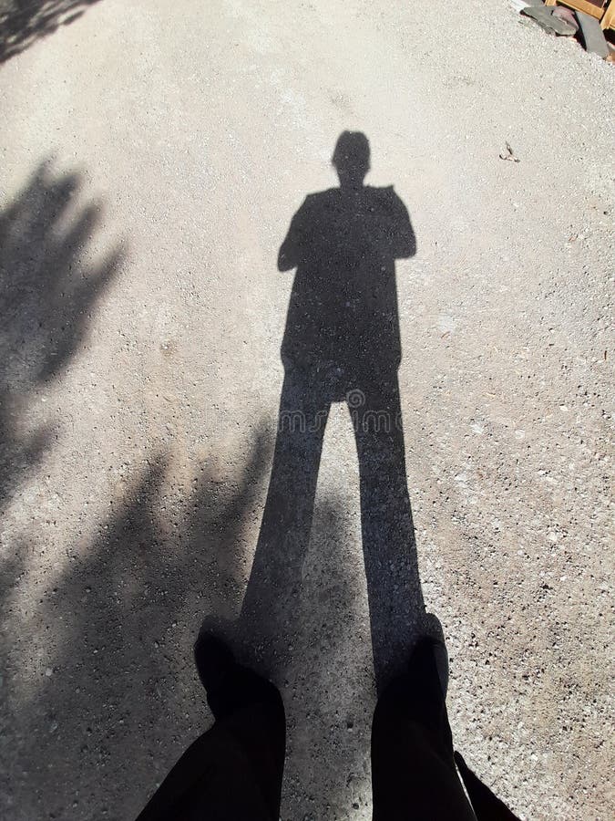 Human Shadow Reflected on the Road Stock Photo - Image of limb ...