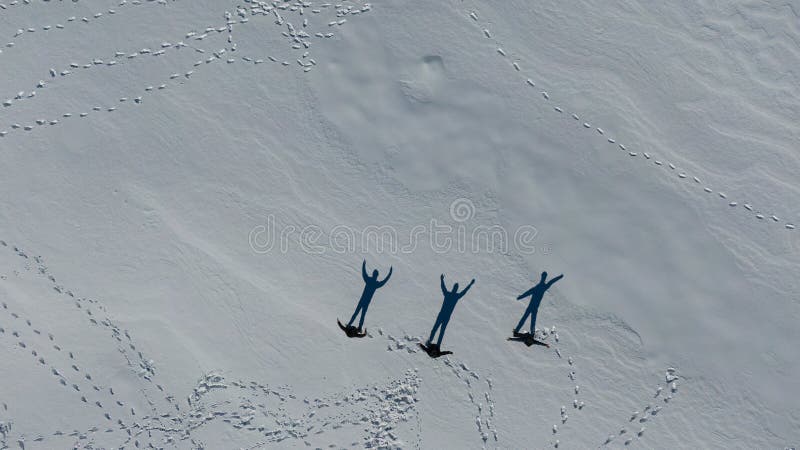 Human Shadows and Footprints on the Snow Stock Photo - Image of snow ...