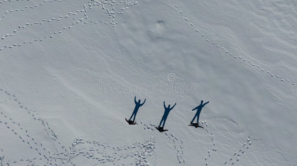 Human Shadows and Footprints on the Snow Stock Photo - Image of snow ...