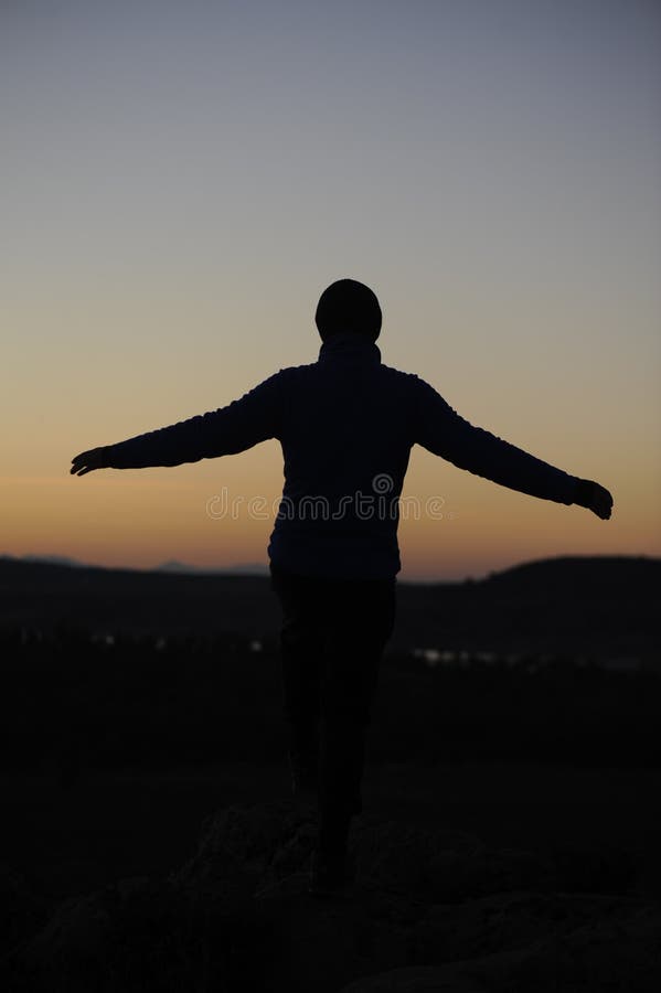 Human silhouette at sunset editorial stock photo. Image of sunset ...