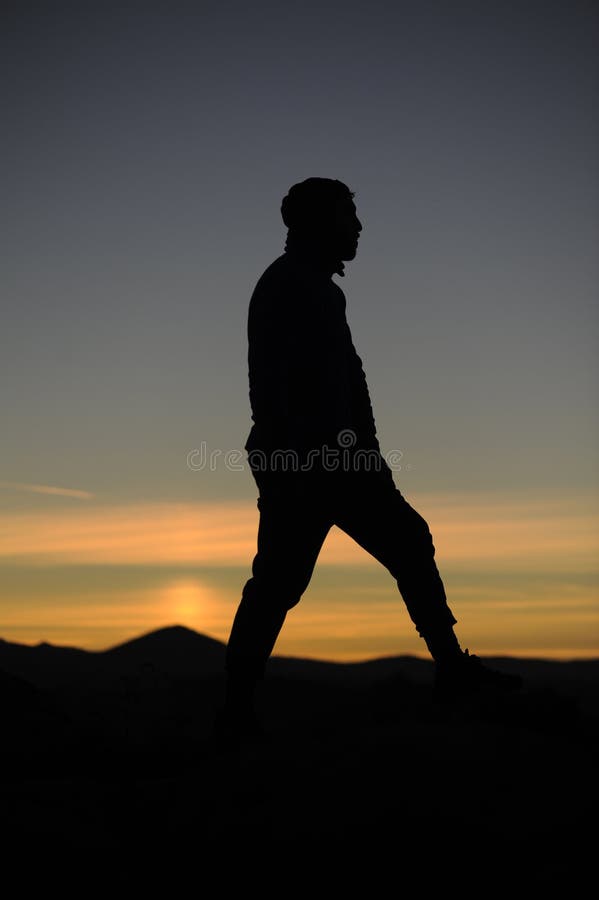 Human silhouette at sunset editorial stock photo. Image of female ...