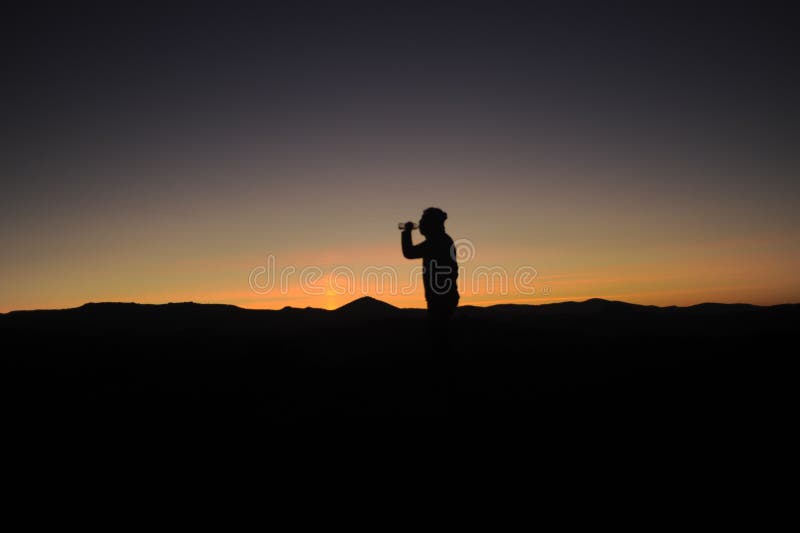 Human silhouette at sunset editorial photography. Image of dark - 130438787