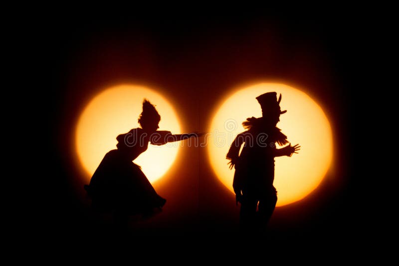 Human Silhouettes Against the Light in the Theater during the ...