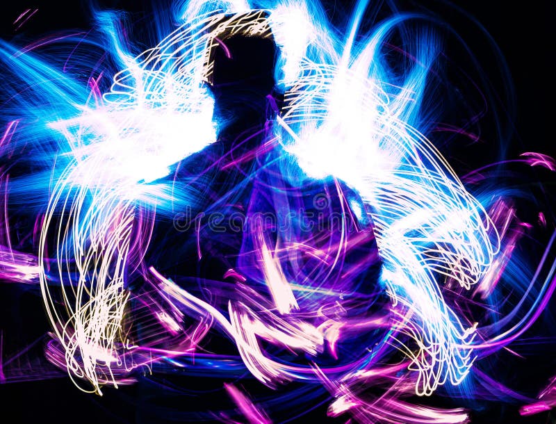 Human Silhouettes between Lights. Light Painting in the Dark Stock ...