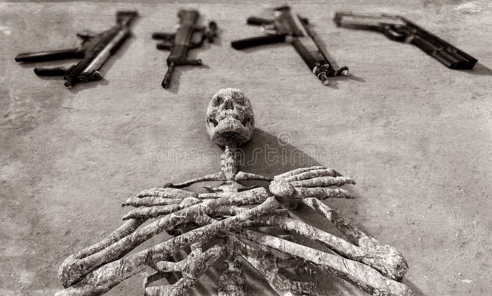 Human skeleton & guns stock photo. Image of lying - 147917280