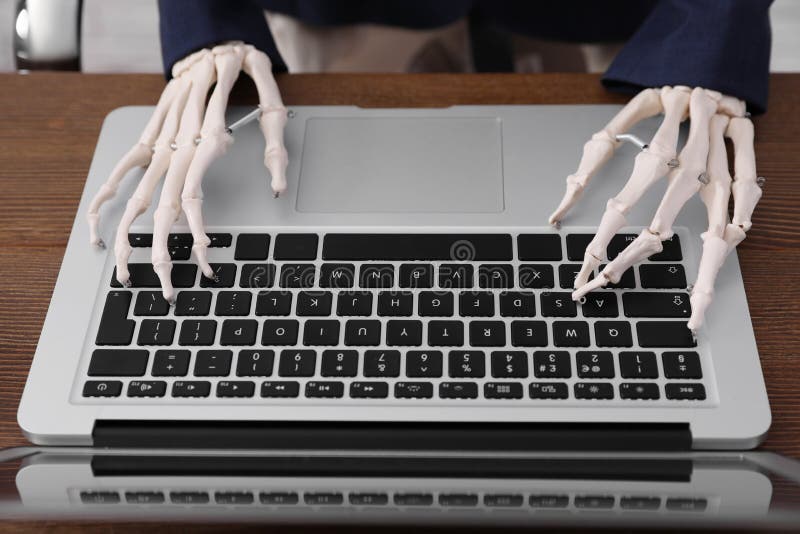 Human Skeleton in Suit Using Laptop at Table Stock Image - Image of ...