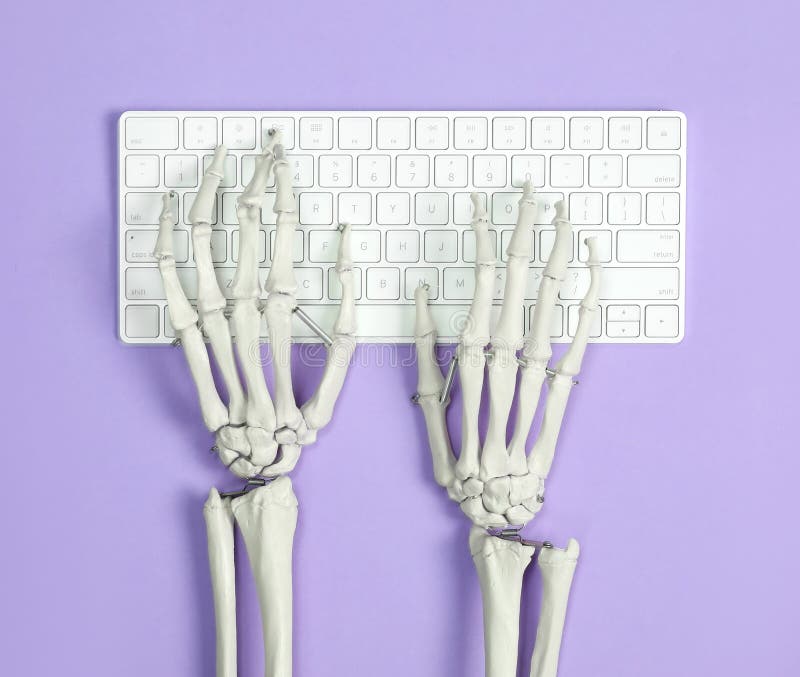 Human Skeleton Using Computer Keyboard on Background, Top View Stock ...