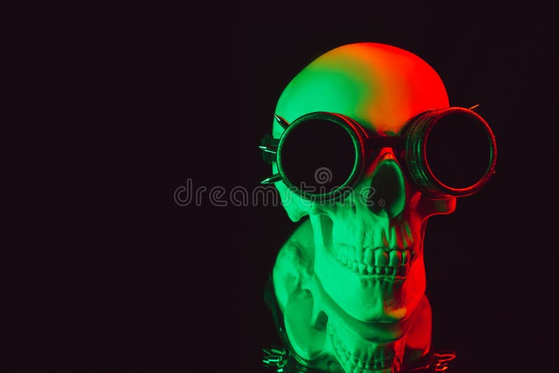 Human Skull in Steampunk Glasses with Mirror Reflection with Colored ...