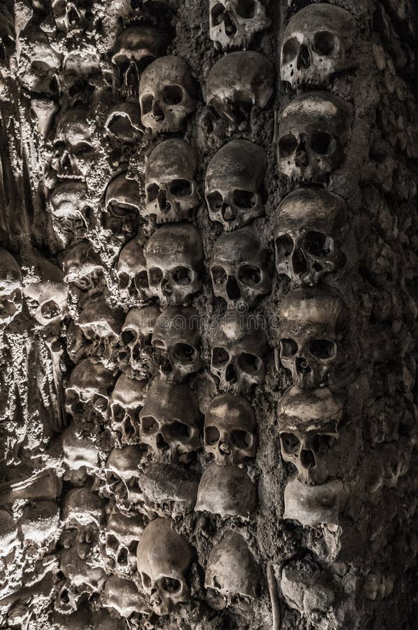 Human Skulls and Bones at a Wall in the Bone Chapel Evora Stock Photo ...
