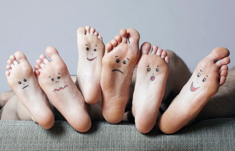 Human Soles with Painted Faces Stock Image - Image of paint, feet: 62456805