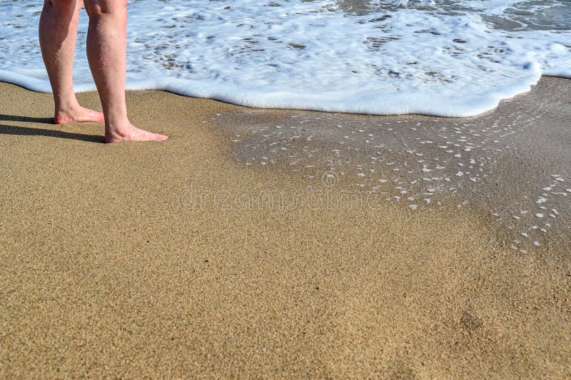 Human Standing in Water on a Sand Beach Stock Image - Image of outdoors ...