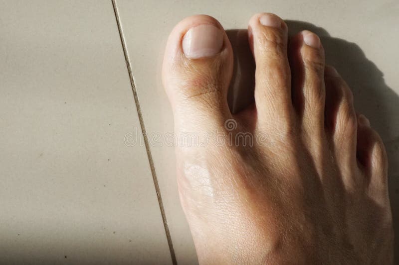 Human Toes on the Floor with Side Lighting Stock Image - Image of ...