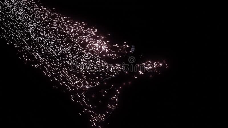 Human Unrecognizable Figure Made of Particles Falling Down with a Trail ...