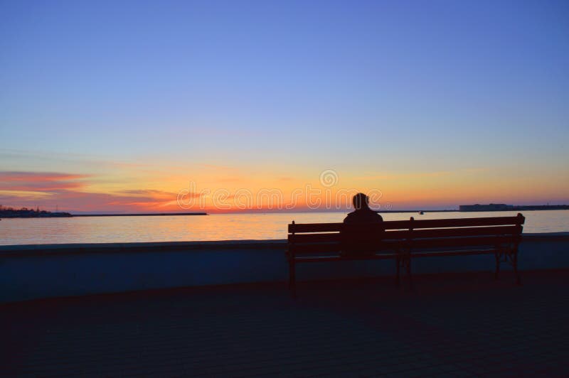 Human watching the sunset stock photo. Image of closeup - 90875834
