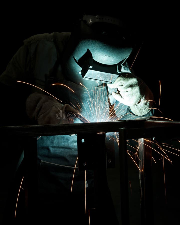 Human Working of Welding with a Lot of Sparks in a Metal Stock Photo ...