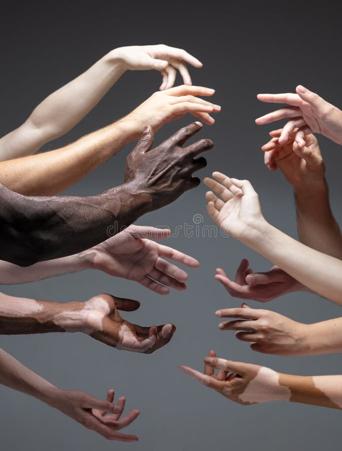Hands of Different People in Touch Isolated on Grey Studio Background ...