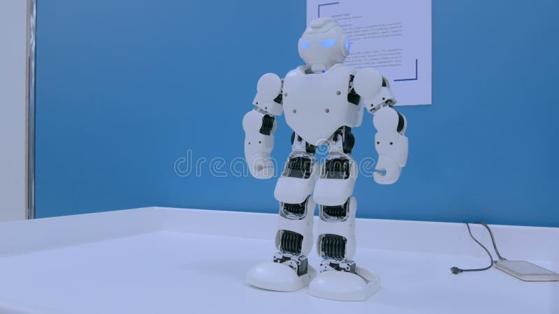 Robot Dancing. Robotic Modern Technology. the Robot Looks into the ...