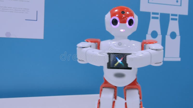 Robot Dancing. Robotic Modern Technology. the Robot Looks into the ...