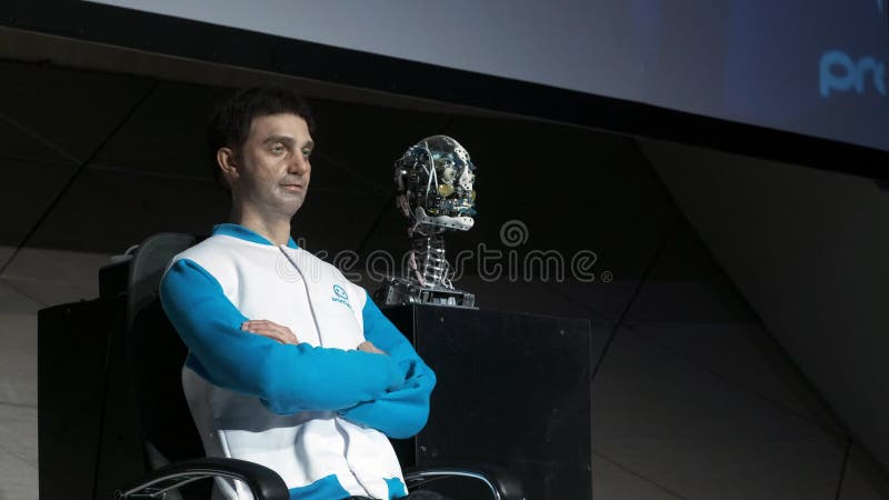 Humanoid Robot Man on Stage. Innovative Development in Robotics and ...