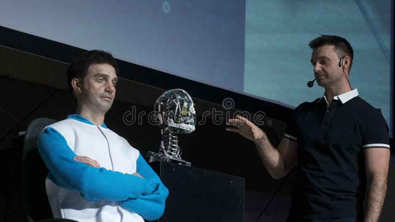 Humanoid Robot Man on Stage. Innovative Development in Robotics and ...