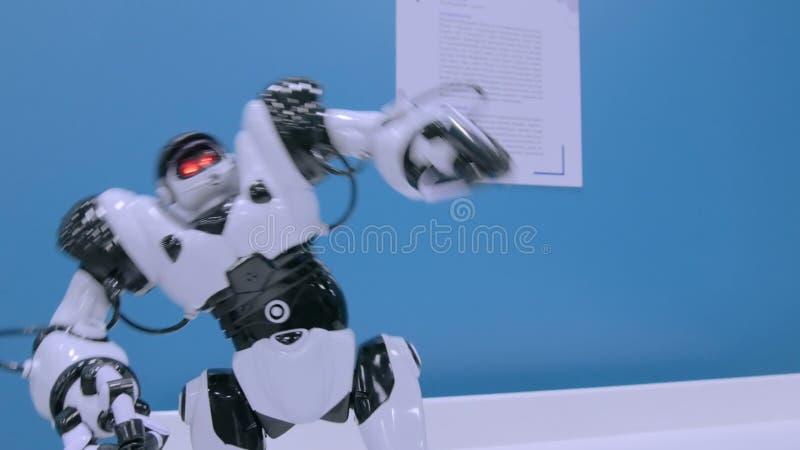 Humanoid Robot Moving Hands and Walking Around at Future Exhibition ...