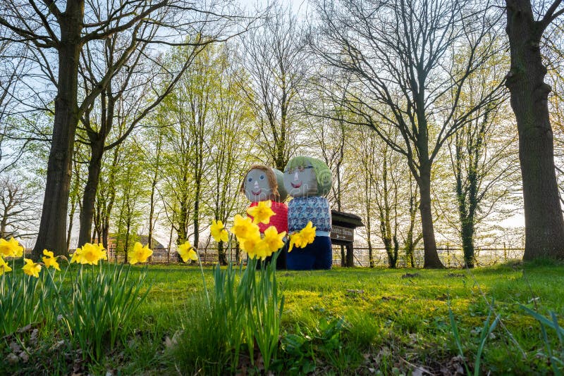 Humans from Hay Bales Stand at the Roadside Stock Photo - Image of road ...