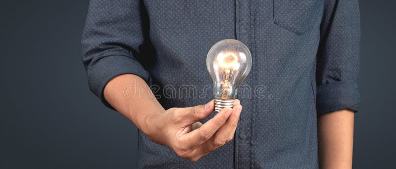 Humans Hold Light Bulbs in Hand Innovative Technology and Creativity ...
