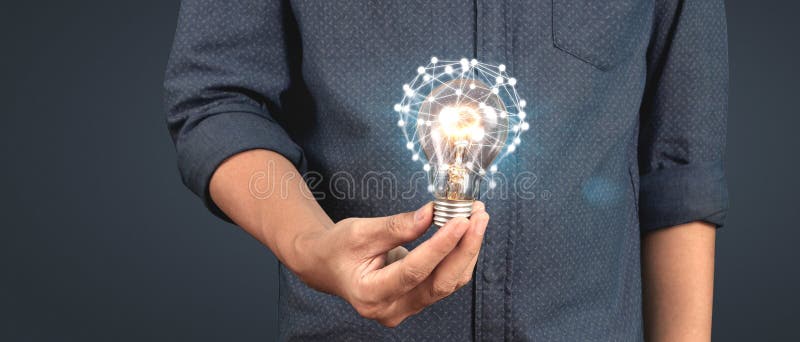 Humans Hold Light Bulbs in Hand Innovative Technology and Creativity ...