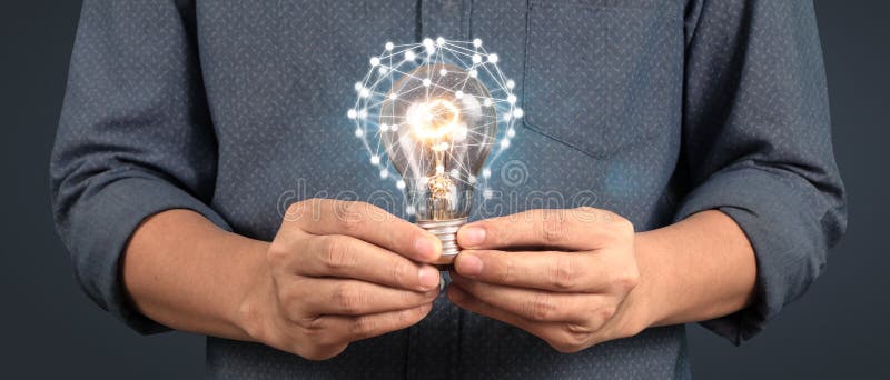 Humans Hold Light Bulbs in Hand Innovative Technology and Creativity ...