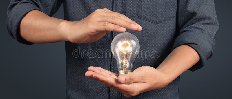 Humans Hold Light Bulbs in Hand Innovative Technology and Creativity ...