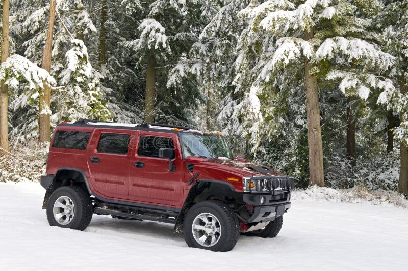 Hummer H2 in the snow stock photo. Image of road, motors - 4203522